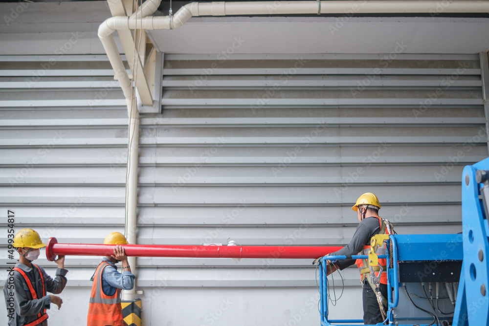 Install fire sprinkler system. In the industrial plant, pipe assembly ...
