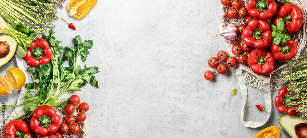 Food background with various vegetables: bell pepper, herbs,asparagus ...