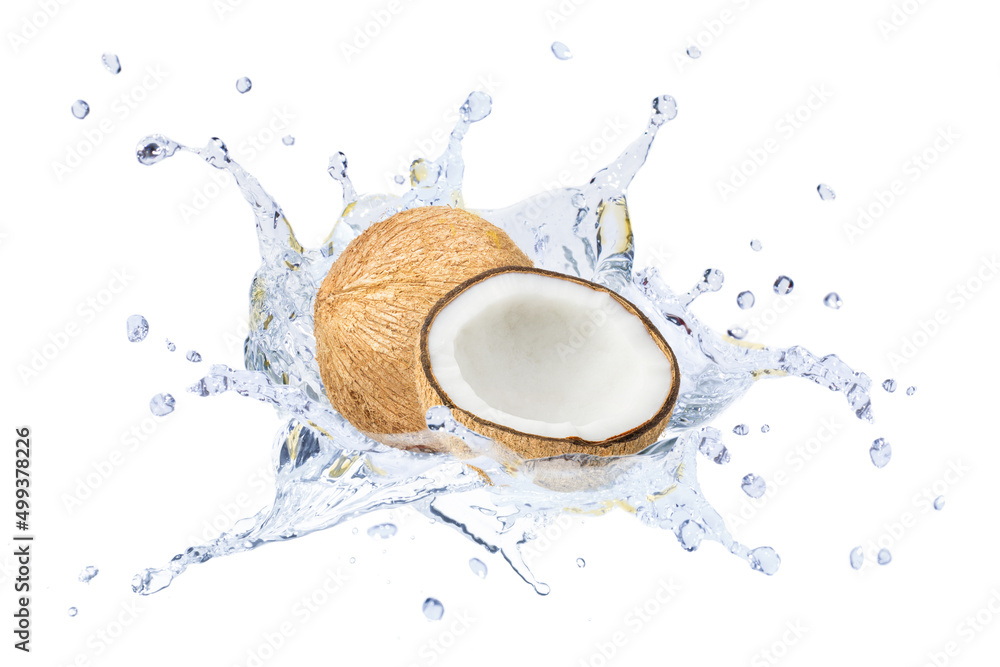 Coconut water splashing from brown coco nut fruit isolated on white ...