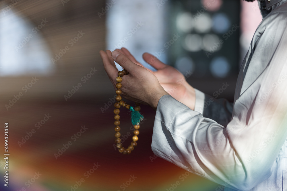 Muslim Arabic man praying. Religious muslim man praying inside the ...