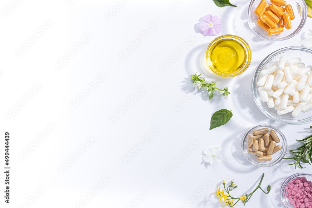 Flat lay composition of various vitamin capsules and dietary ...