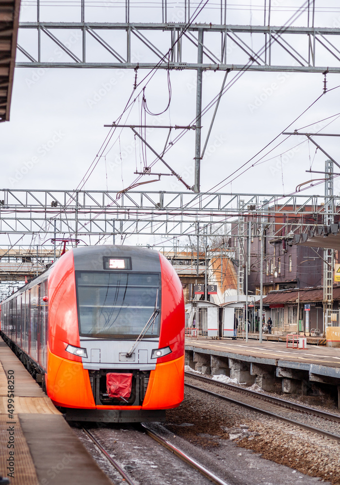 April 1, 2022, Moscow Russia. Modern high-speed train moves fast along ...