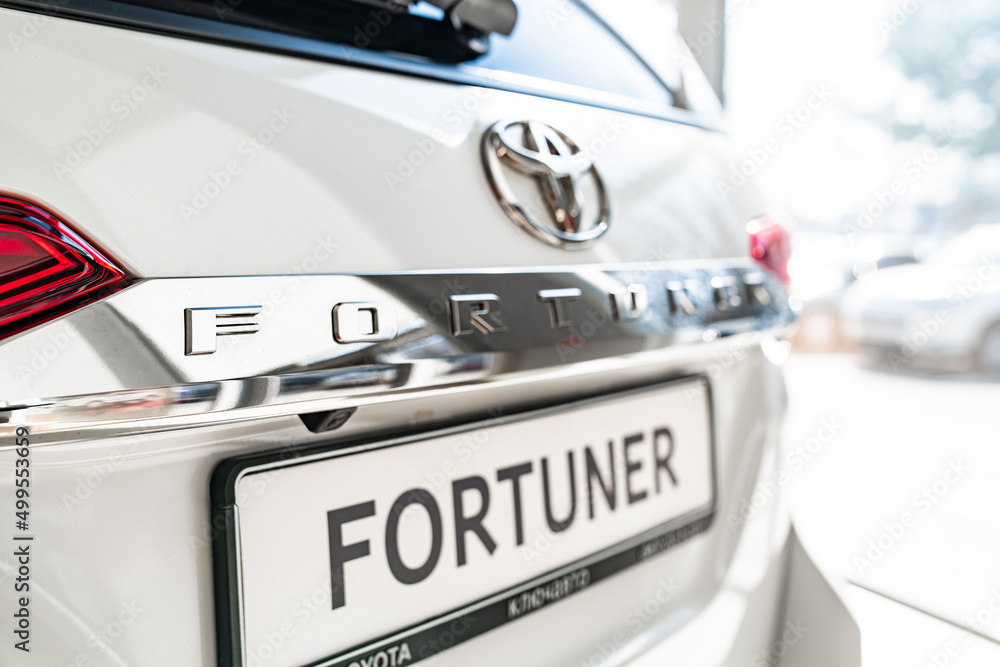 rear view. new white car Toyota fortuner in premises of dealership ...