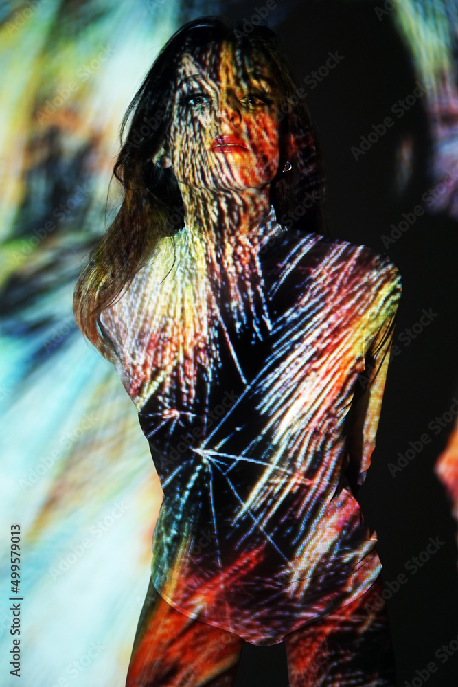 Projection from beamer or projector on woman looks like body painting ...