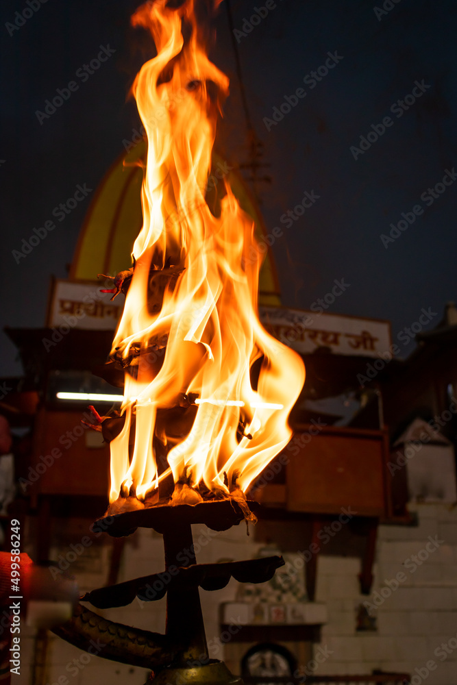 holy ganges aarti flame with temple background at evening Stock Photo ...