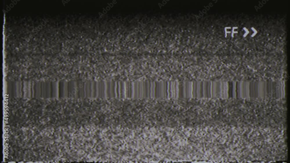 An overlay featuring a VHS fast forward effect and noise on a seamless ...