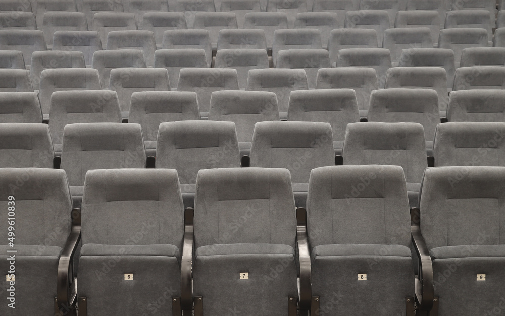 Seats in cinema theater opera concert hall with numbers in first row ...