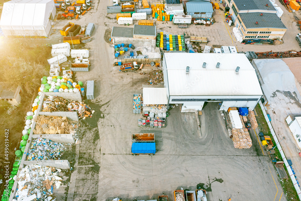 Top view of a landfill with various waste. Many dumpsters and garbage ...