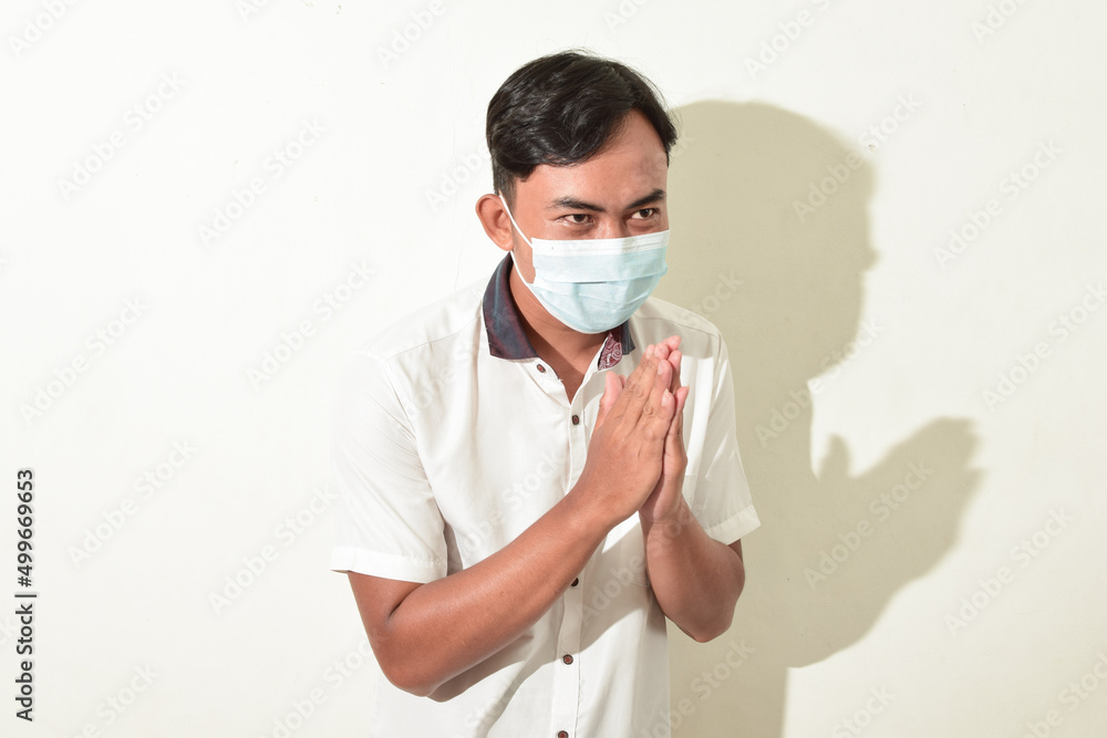 asian man with greeting gesture apologizing. hand gesture greeting ...