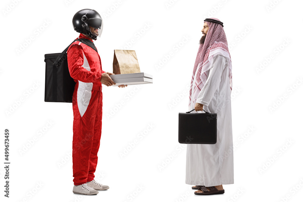 Delivery man with a helmet delivering pizza and food to a saudi arab ...