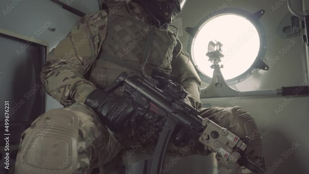 people with weapons in their hands. soldiers in camouflage military ...