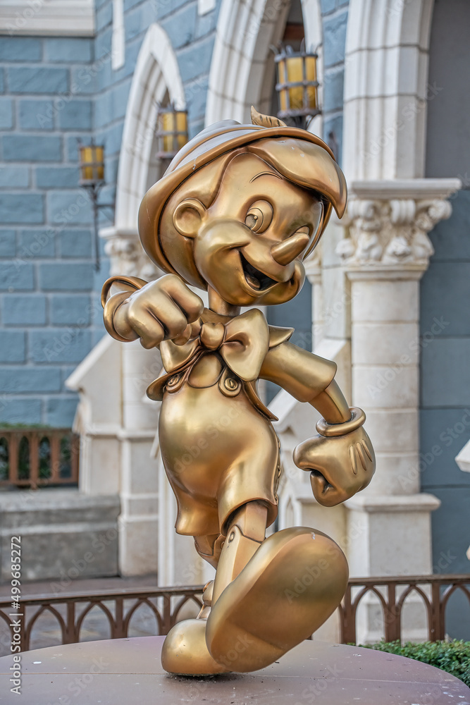 Pinocchio Gold Statue 50th Anniversary Disney Stock Photo | Adobe Stock