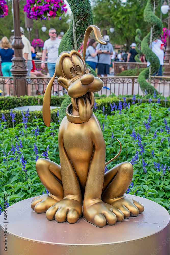 Pluto Gold Statue 50th Anniversary Disney Stock Photo | Adobe Stock