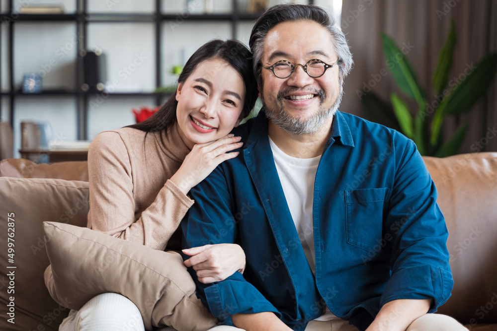 Asian Middle-aged Asian couple smiling at the camera. Family couple ...