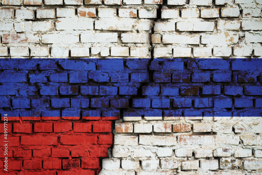 Flag of Russia and russian anti-war flag on brick wall with big crack ...