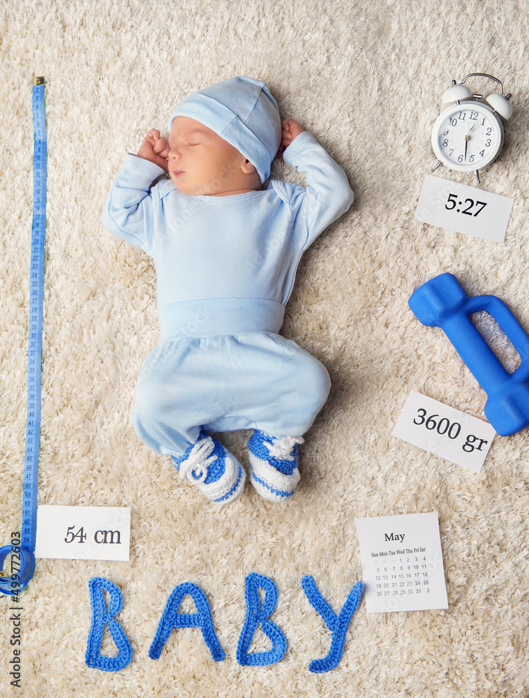 Newborn Baby Weight and Length. Sleeping one Month Child in Blue ...