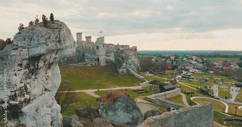 Castle in Ogrodzieniec. A stone medieval castle built on a rock, made of white stone. View of ...