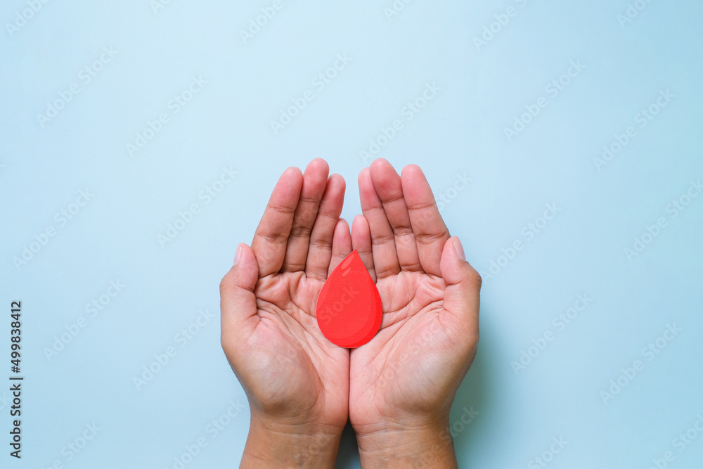 Hands holding blood drop, world blood donor day concept Stock Photo ...