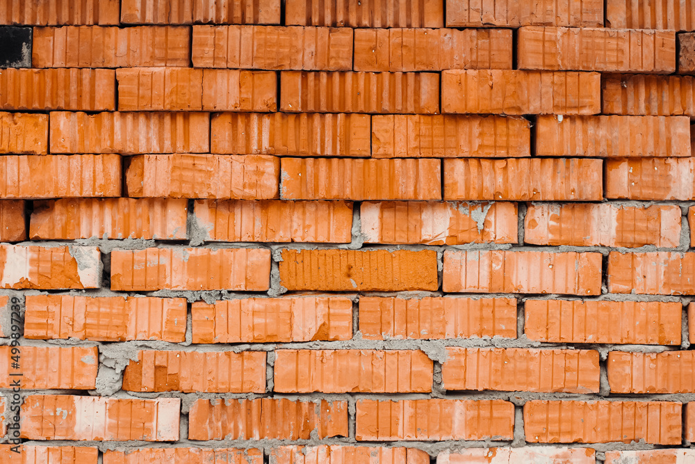 Foto de Texture of a brick wall with cement mortar between bricks ...