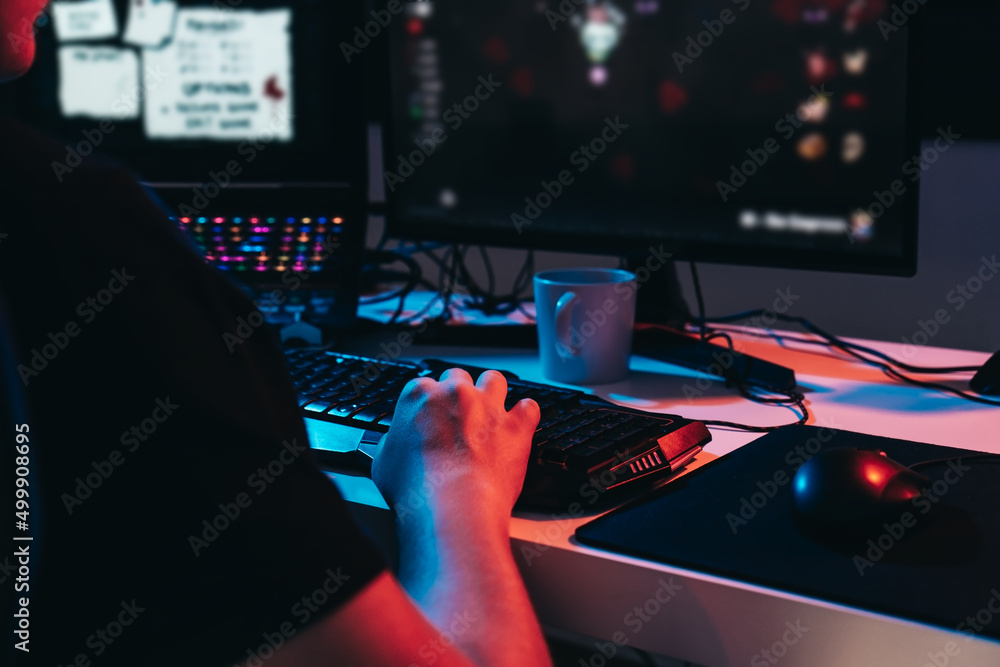 Close-up of the hands of a young online video game professional ...