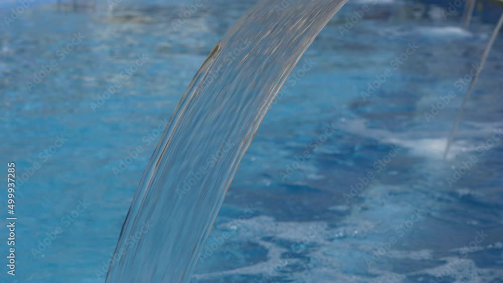 Fresh water jet of a swimming pool. Regenerating jet. Health centre ...