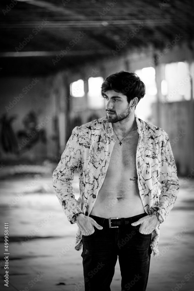 handsome Italian dark-haired guy with shirtless elegant jacket in ...
