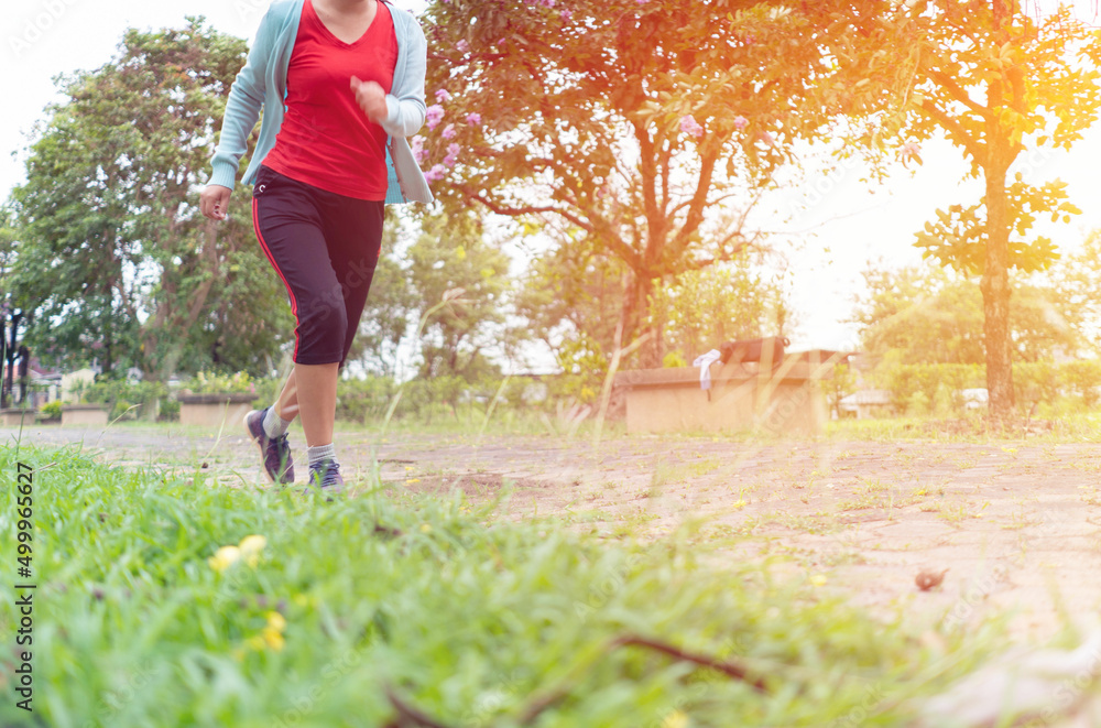 Fit young woman running in park.Running woman atletic spotsman trains ...