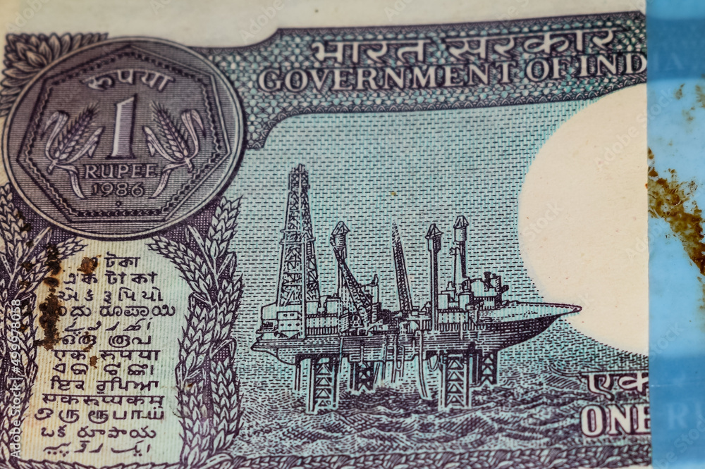 Old One Rupee notes combined on the table, India money on the rotating ...