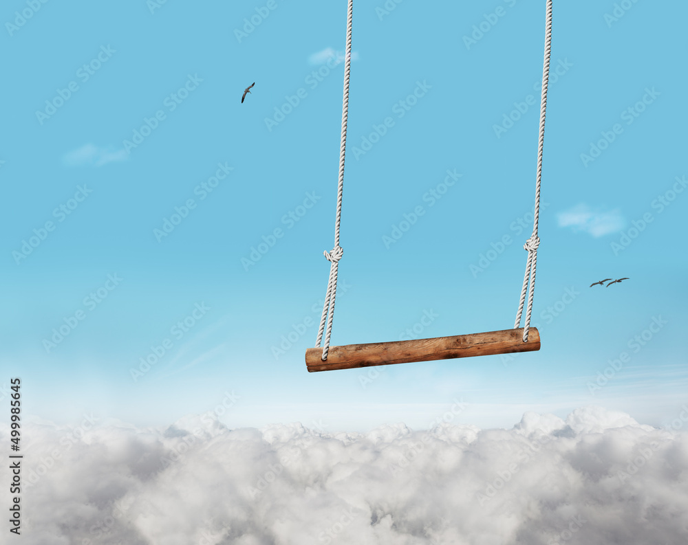 Swing bar swinging over blue sky with clouds foam Stock Photo | Adobe Stock