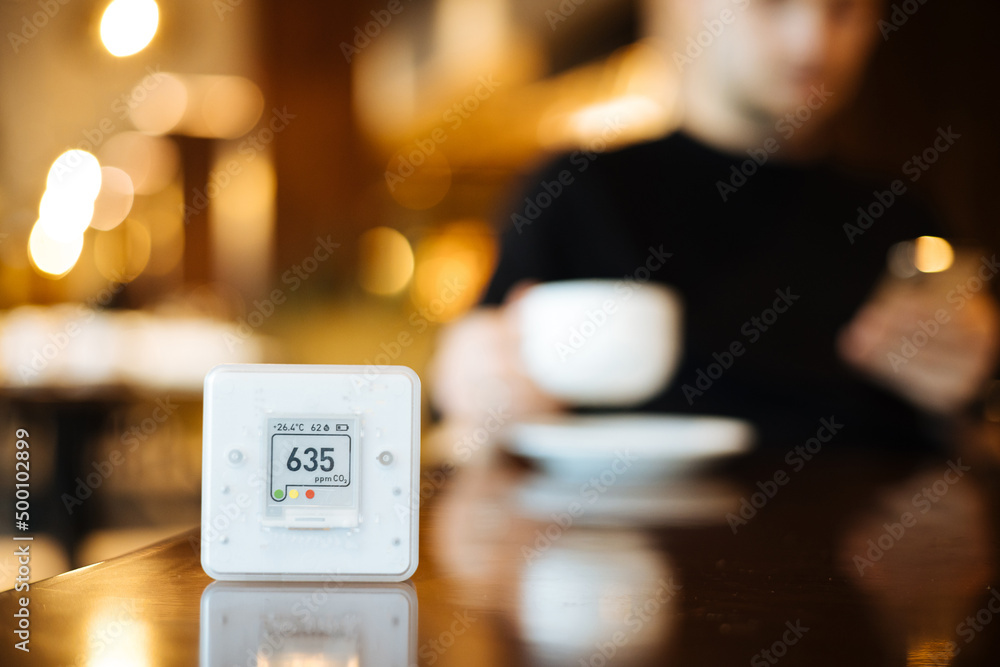 CO₂ sensor monitor. Indoor air quality sensor. Healthy work environment ...