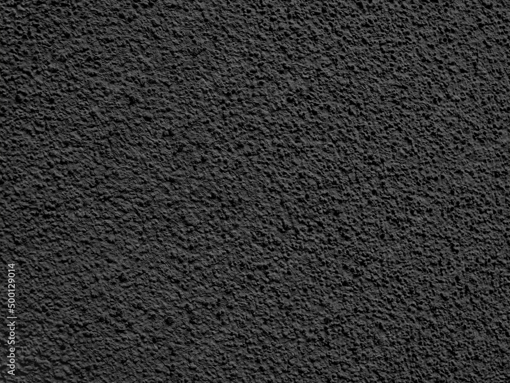 Black rough grainy surface texture. Decorative plaster. Background for ...