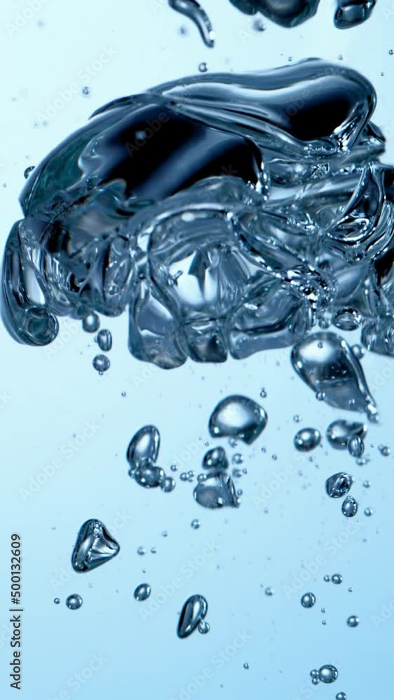 Authentic natural gas bubble wand vertical loop background. Macro ...