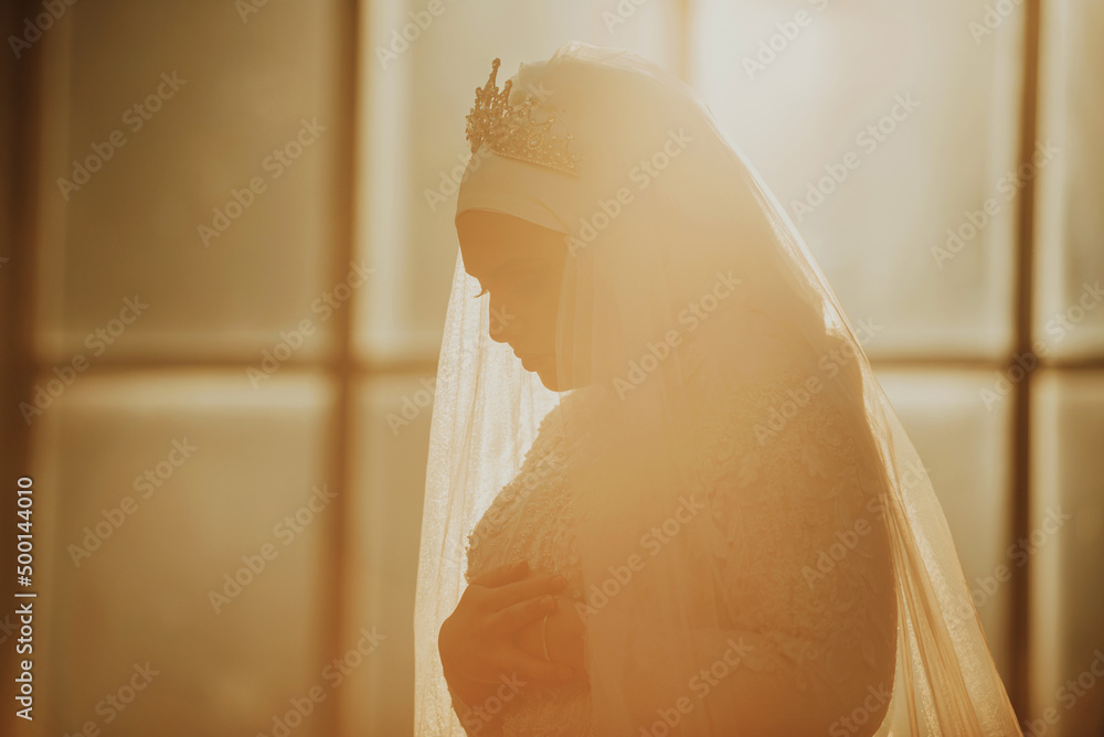 Islamic wedding ceremony at mosque. Bride and groom sitting in mosque ...