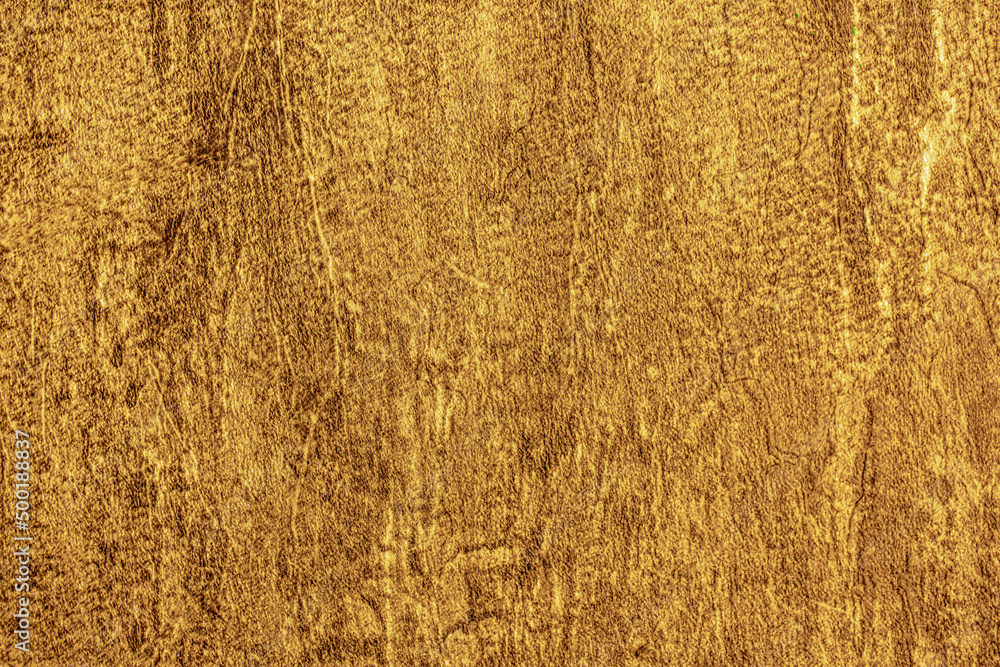 Golden wall with abstract spots as a background. Beautiful golden ...
