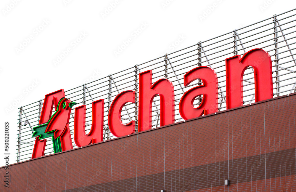 Poland, Bydgoszcz - April 20, 2022: Auchan logo on front store. French ...