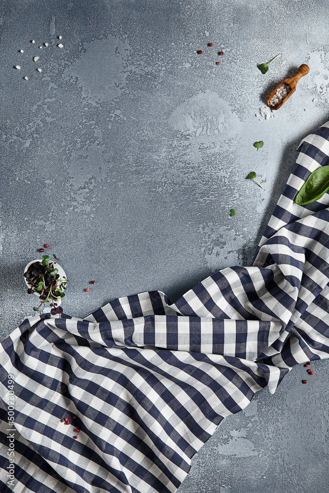 Empty gray stone background with textile and ingredients. Food ...