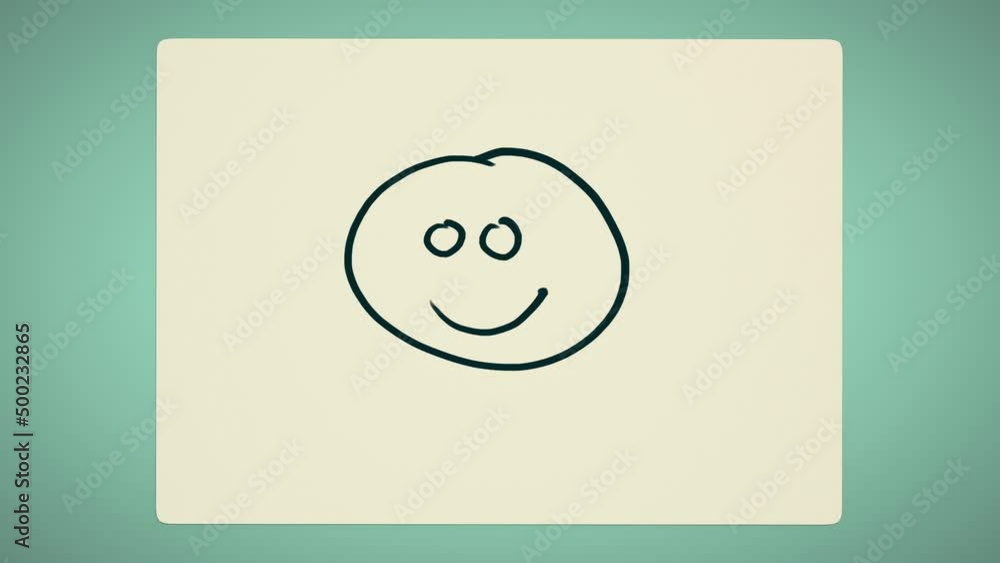 A sheet of paper with a smiley face drawn curls into a ball and ...