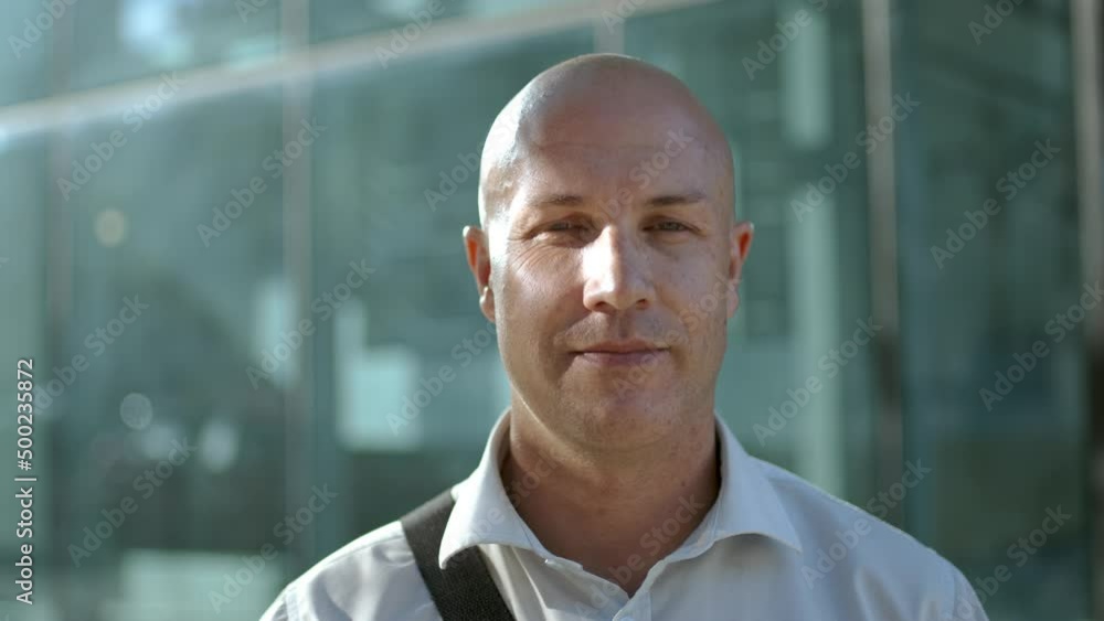 Mid adult businessman with bald head. Closeup portrait of a man ...