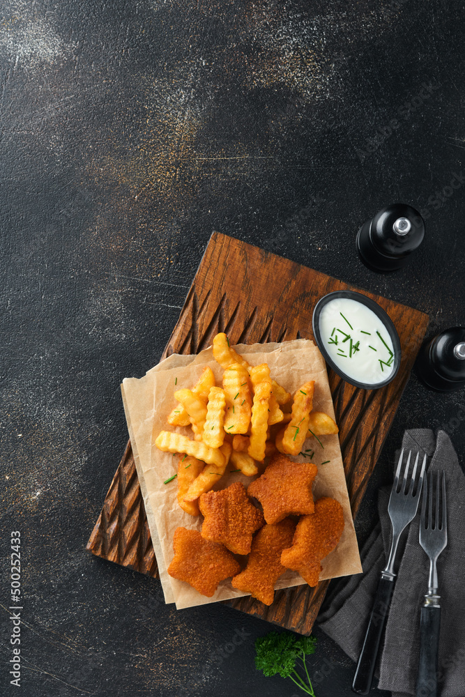 Fish and Chips british fast food. Fish Sticks with french fries set on ...