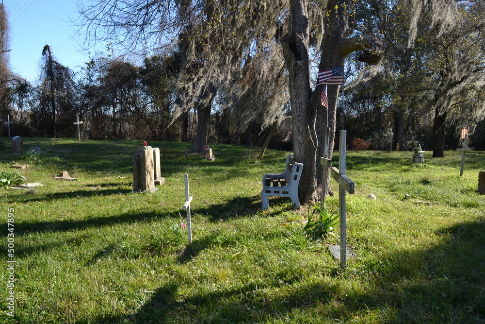 Bench under the tree and US flag, Hodges Bend Cemetery, Sugar Land ...