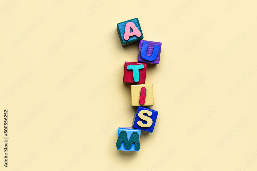 Cubes with word AUTISM on beige background Stock Photo | Adobe Stock
