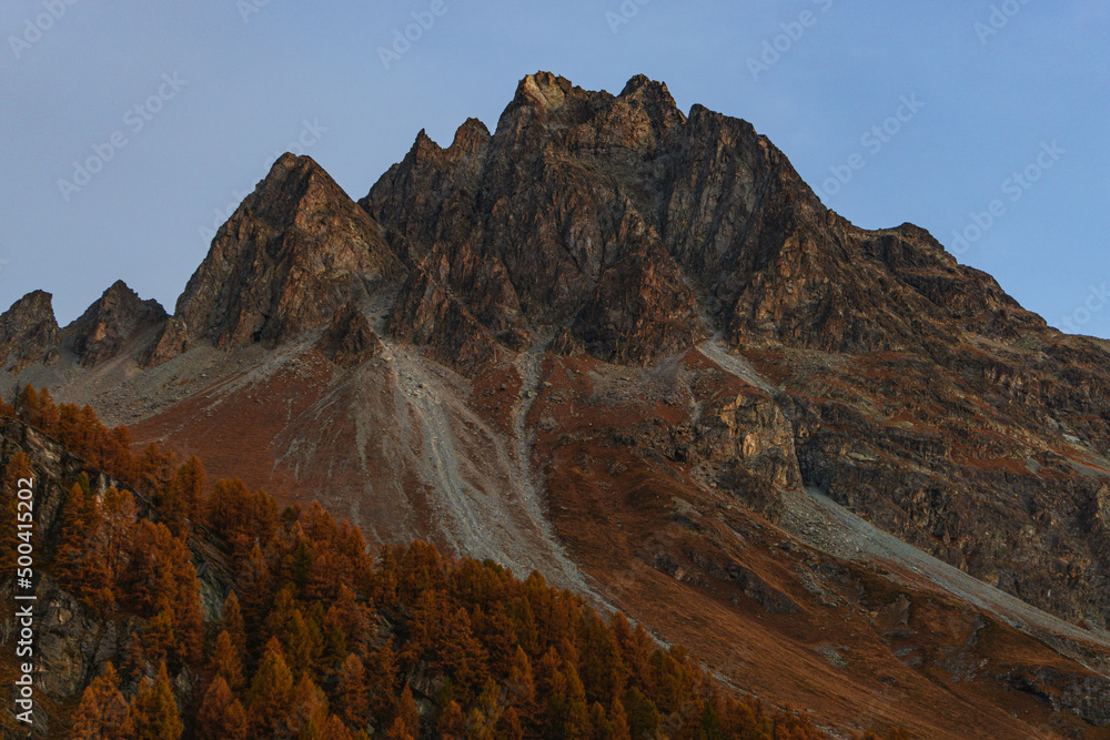 autumn in the Swiss Alps with its colors, mountains, glaciers and ...