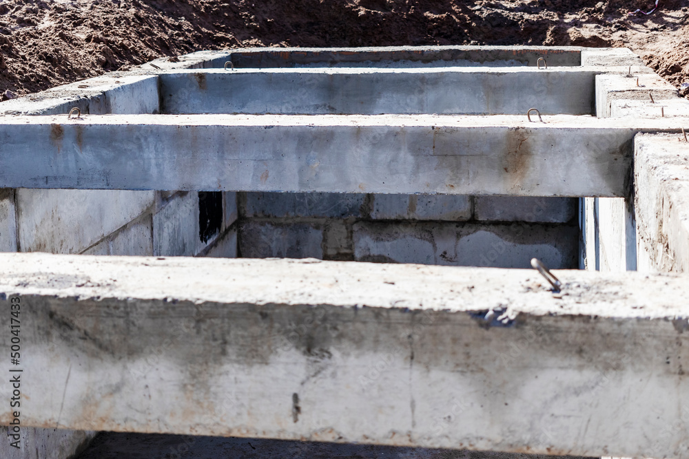 Laying of underground pipes in concrete chamber. Installation of water ...