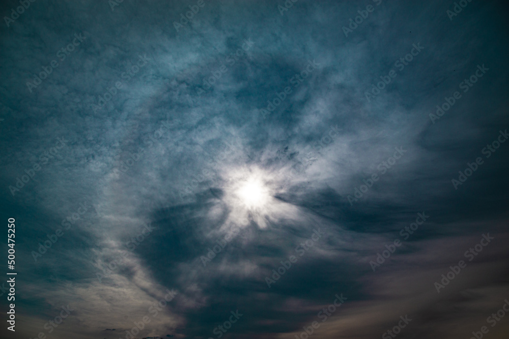 Photo & Art Print rainbow ring around sun in cloudy day, Viktoriia