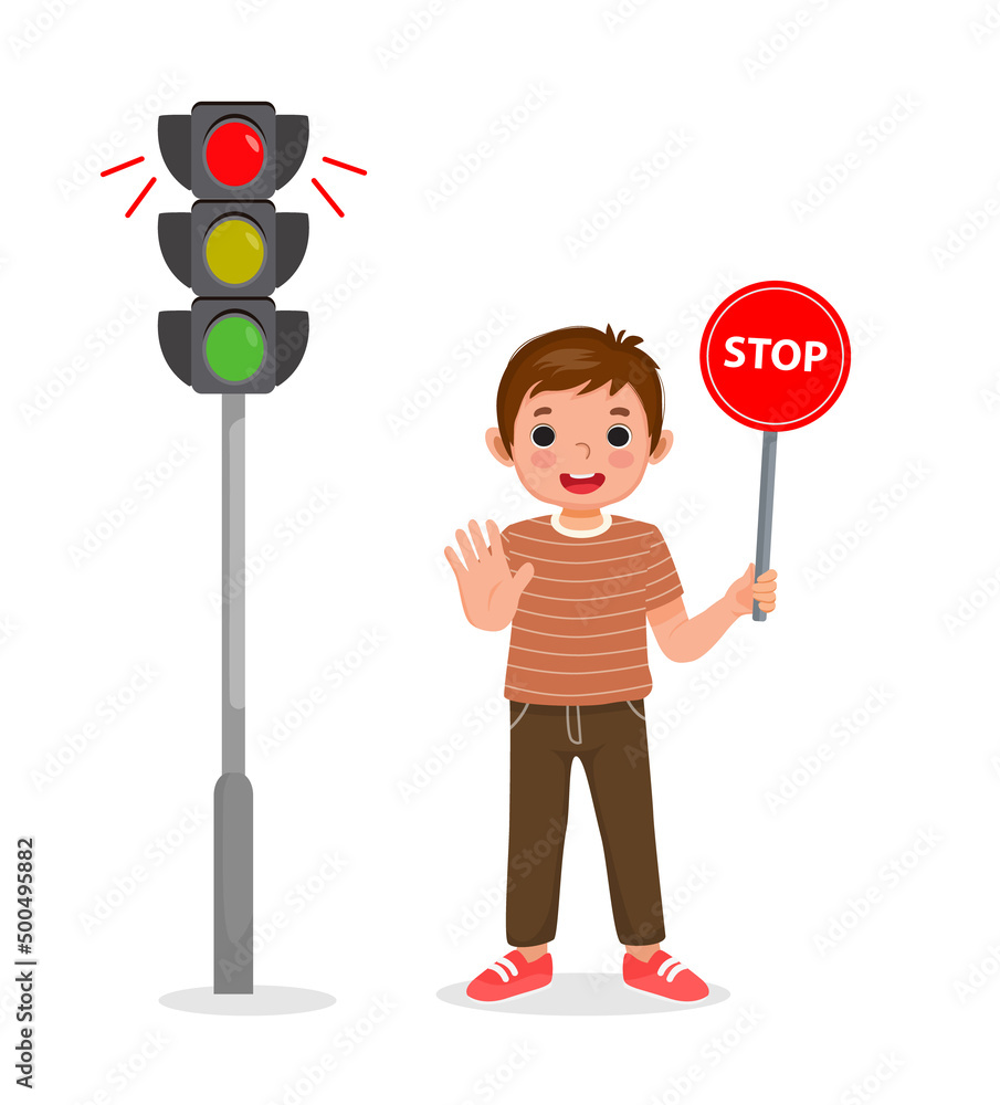 cute little boy holding stop sign board showing traffic light indicator ... cute little boy holding stop sign board showing traffic light indicator ...