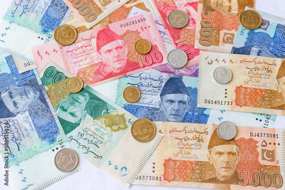 Pakistani paper currency notes with coins Stock Photo | Adobe Stock