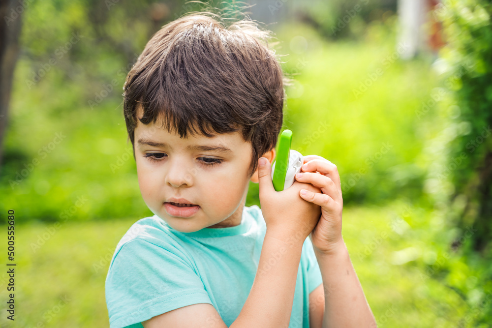 Small boy,kid,child play in walkie-talkie.Walkie Talkies with channels ...