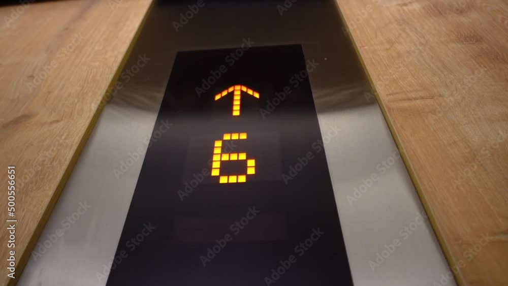 Movement of elevator up. The LCD screen shows countdown from one to ...