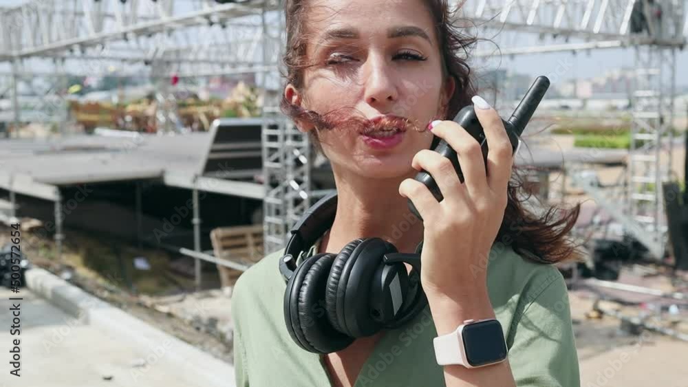 Event manager portrait. Installation of stage equipment and preparing ...