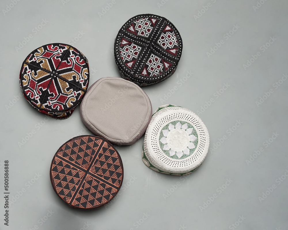 Collection of kopiah hat or peci with a variety of color and shape ...